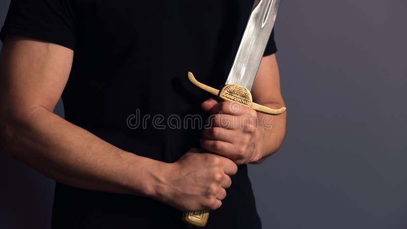 Young Athletic Man Holding His Sword Stock Image - Image of creed ...