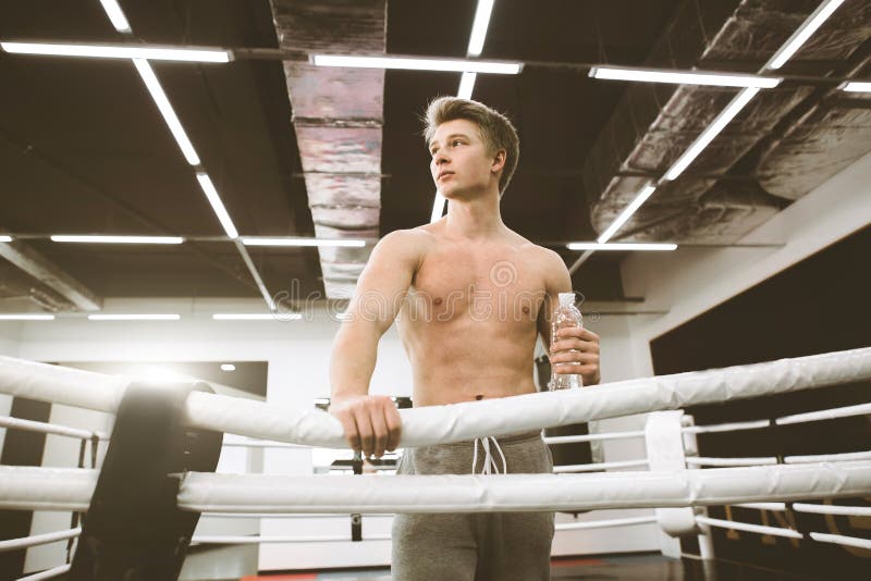 Young Athletic Man Resting after Hard Training To Box, Fighting on the ...