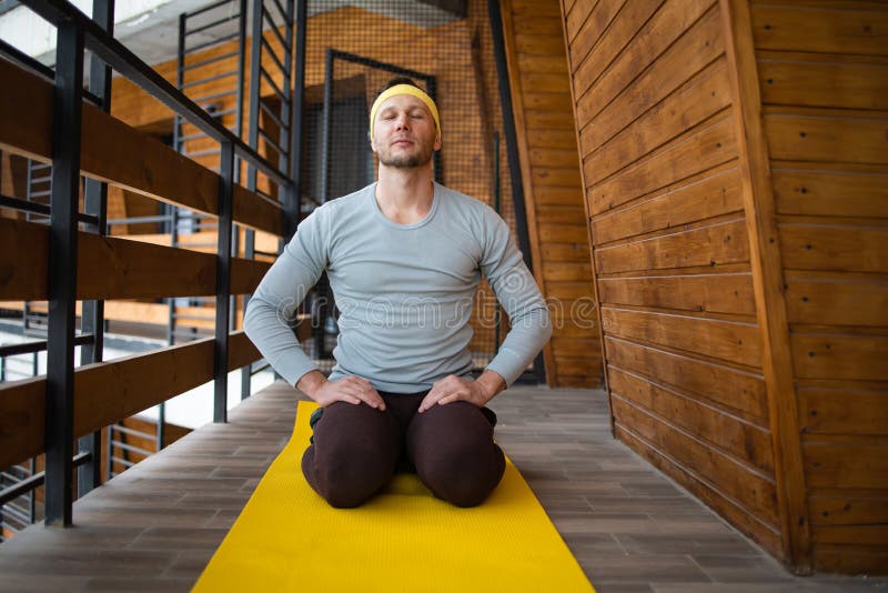 Young Athletic Man is Training at Home, Doing Exercise, Working Hard To ...