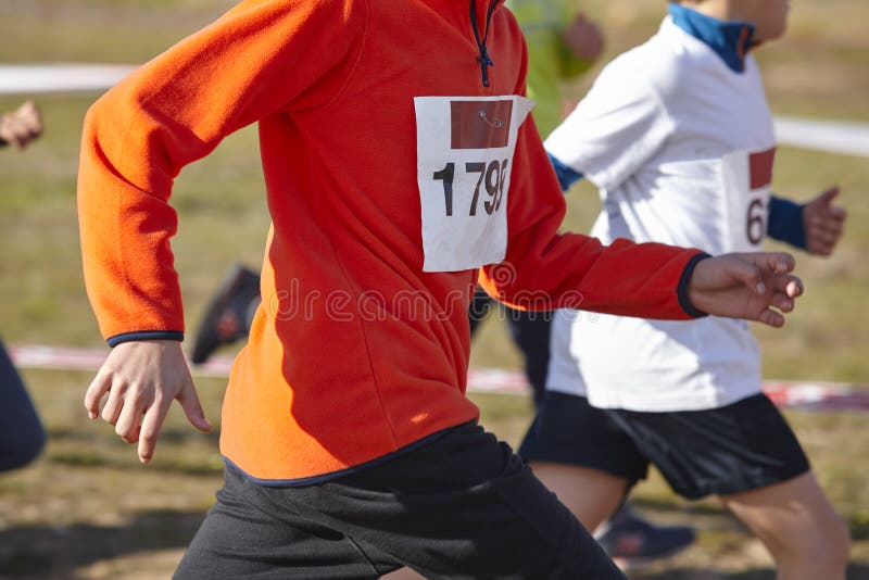 Young Athletics Runners on a Race. Outdoor Circuit Stock Photo - Image ...