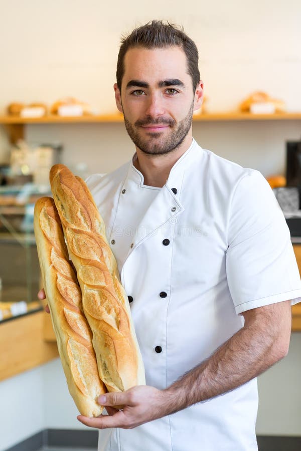 Young Attarctive Baker Working at the Bakery Stock Image - Image of ...