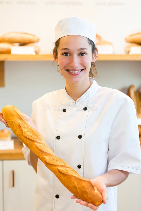 Young Attarctive Baker Working at the Bakery Stock Image - Image of ...