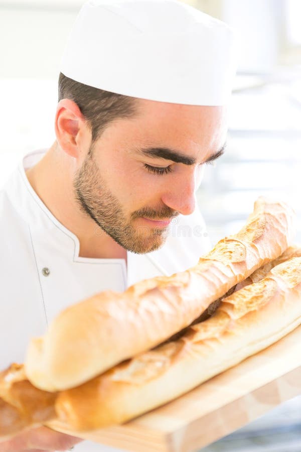Young Attarctive Baker Working at the Bakery Stock Photo - Image of ...