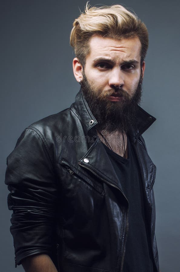 Attractive Bearded Man Reading in a Park Stock Image - Image of male ...