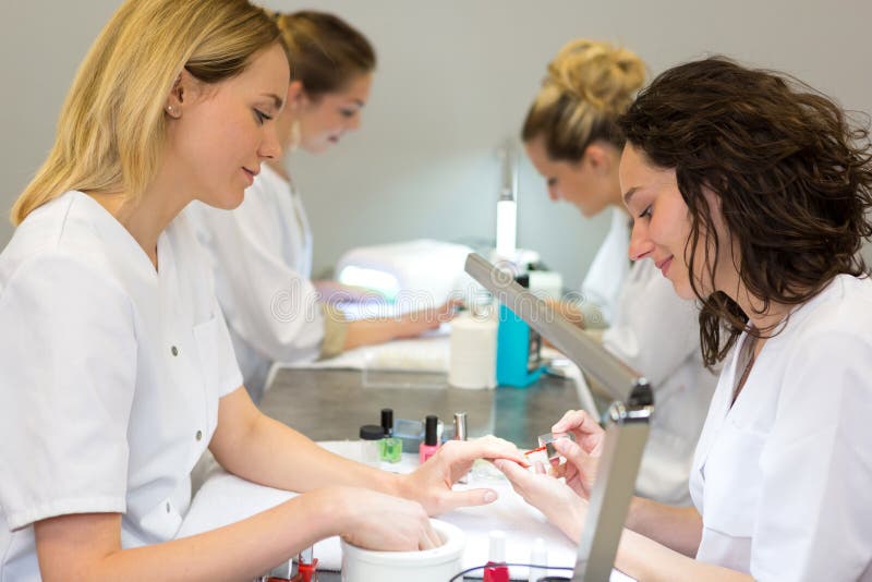 Young Attractive Beautician Students Practising during Courses Stock ...