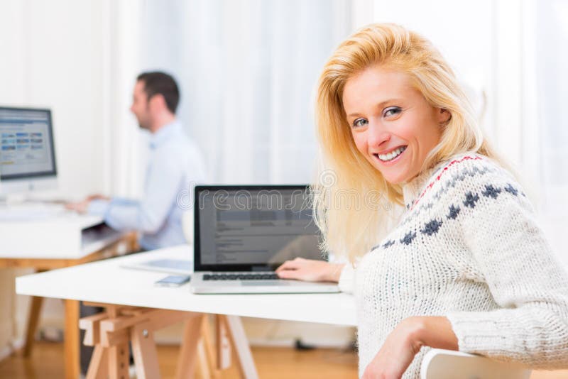 Young Attractive Blonde Woman Working on Computer Stock Photo - Image ...