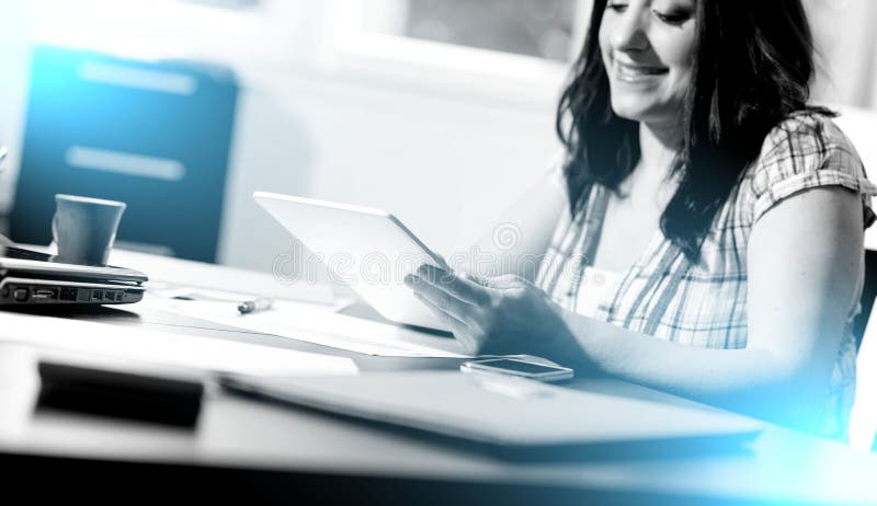 Young Attractive Businesswoman Using a Tablet, Light Effect; Multiple ...