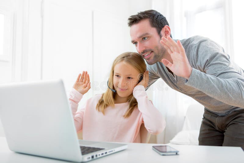 Young Attractive Dad and His Daughter Video Calling Stock Image - Image ...