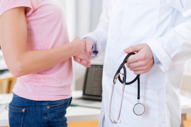 Young Attractive Doctor Shaking Hand of His Patient Stock Photo - Image ...