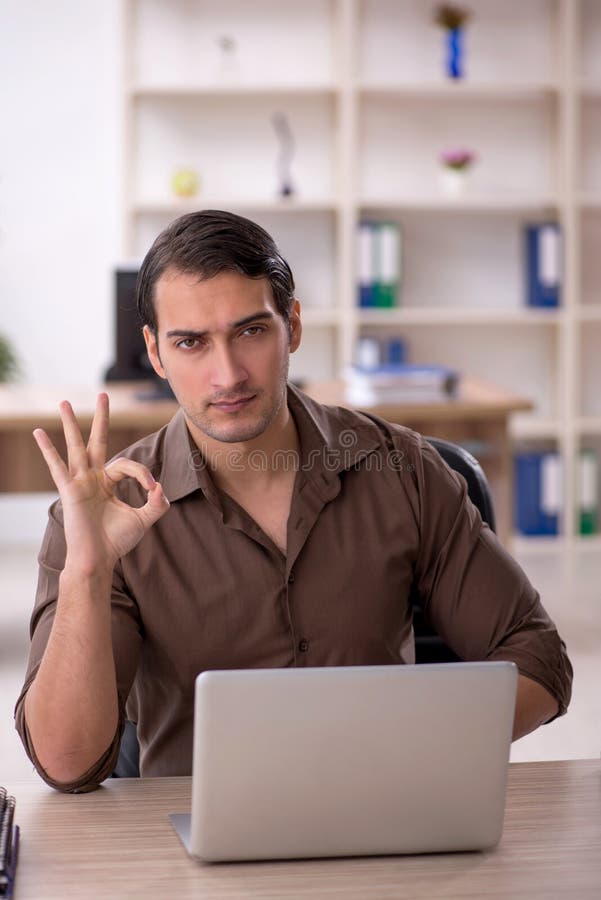 Young Attractive Employee Sitting in the Office Stock Image - Image of ...