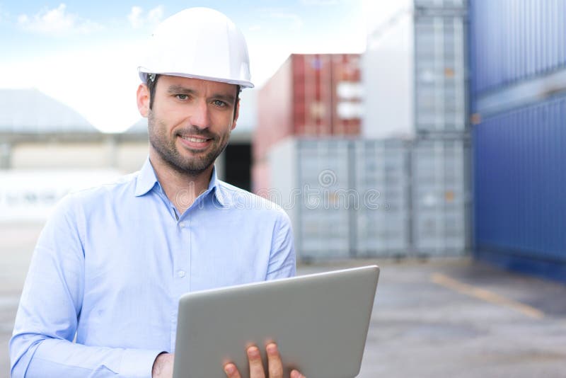 Young Attractive Engineer Using Laptop on the Dock Stock Image - Image ...