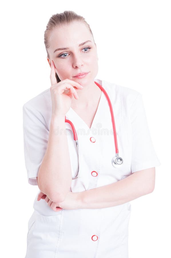 Young Attractive Female Doctor Wearing White Coat And Thinking Stock