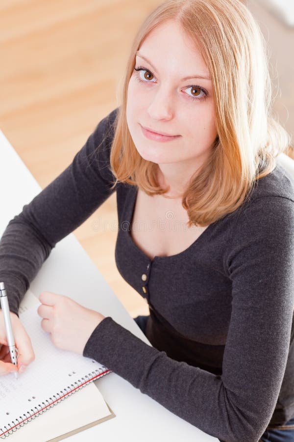Young Attractive Female Student Taking Notes Stock Image - Image of ...