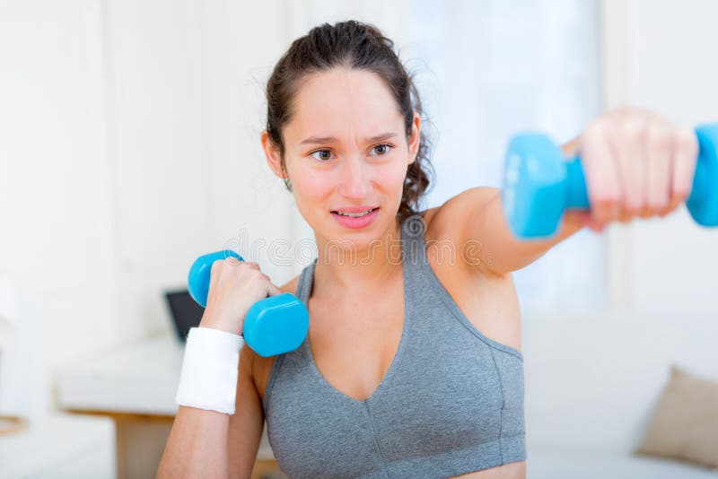 Young Attractive Girl Doing Exercise at Home Stock Photo - Image of ...