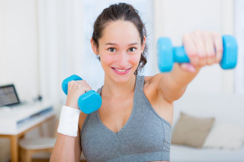 Young Attractive Girl Doing Exercise at Home Stock Photo - Image of ...