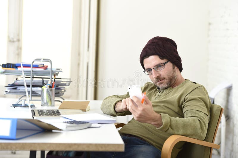 Young Attractive Hipster Businessman Working From Home Office With