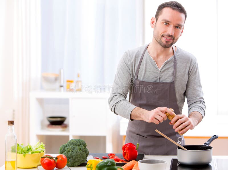 Handsome Man Cooking in the Kitchen Stock Photo - Image of lifestyle ...