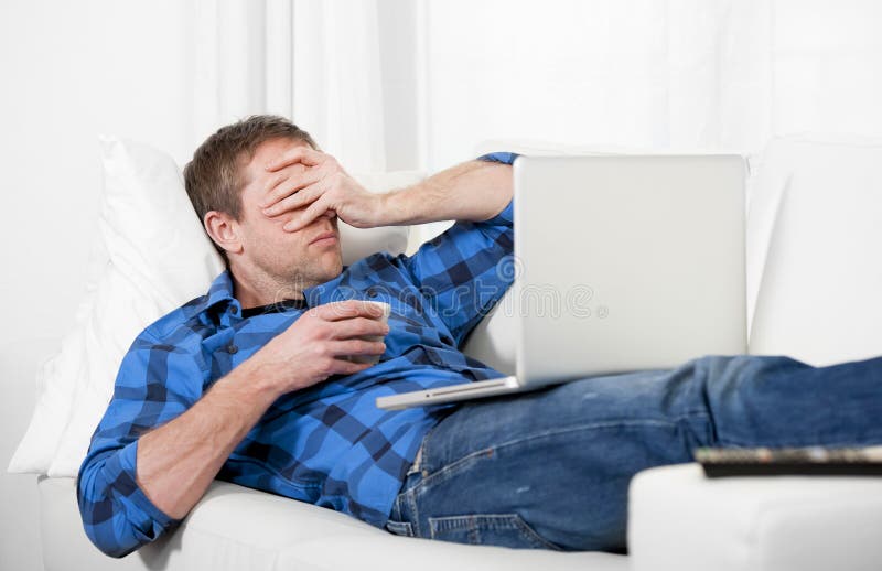 Young Attractive Man with Headache and Stress Using Computer Stock ...