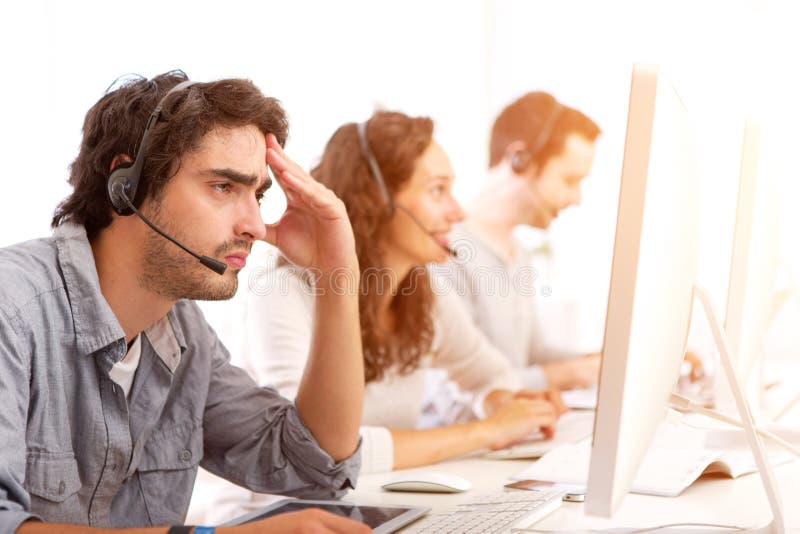 Young Attractive Man Ill-at-ease at Work Stock Image - Image of ... Young Attractive Man Ill-at-ease at Work Stock Image - Image of ...