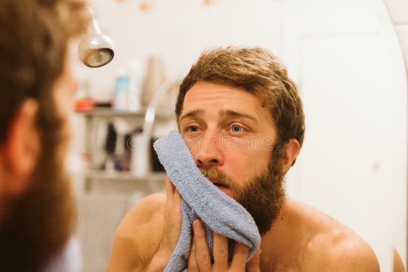 Young Attractive Man Looking in Mirror in Morning Stock Image - Image ...