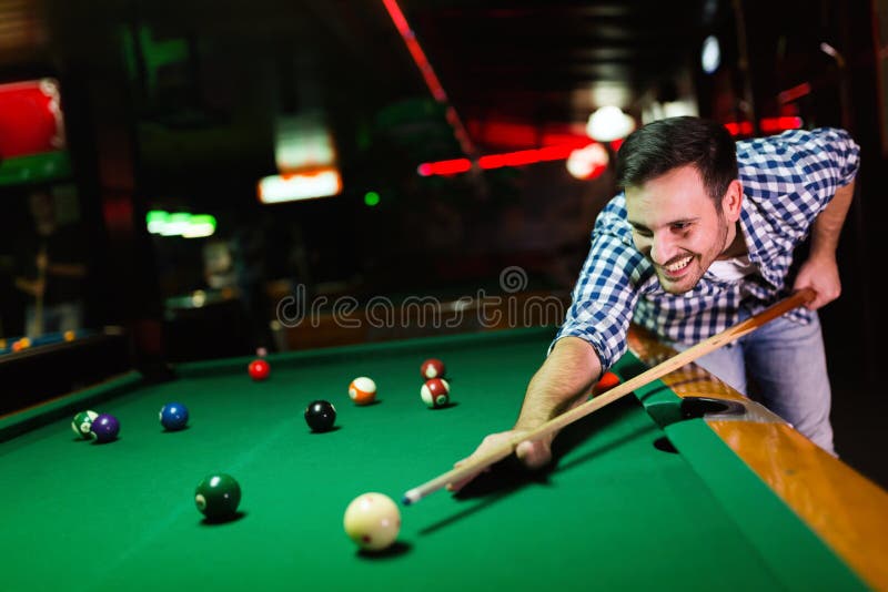 Young Attractive Man Playing Pool in Bar Stock Photo - Image of playing ...