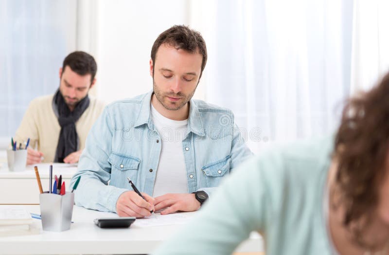 Young Attractive Man Taking Exams Stock Photo - Image of education ...