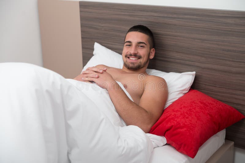 Young Attractive Man Waking in Up Stock Image - Image of peaceful, life ...