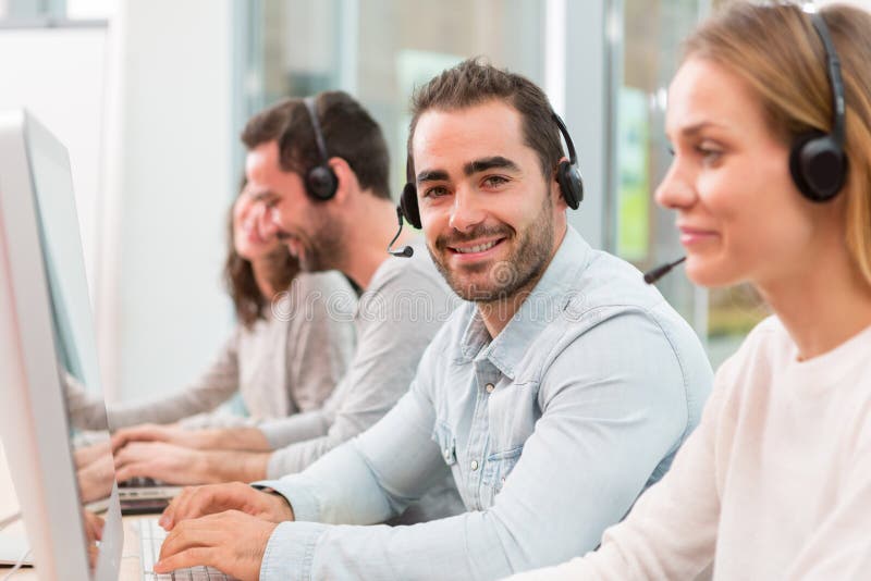 Young Attractive Man Working in a Call Center Stock Image - Image of ...