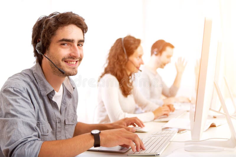 Young Attractive Man Working in a Call Center Stock Image - Image of ...