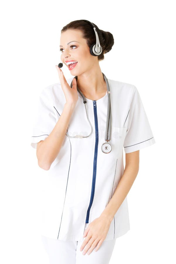 Young Attractive Nurse with Stethoscope and Headphones and Micro Stock ...
