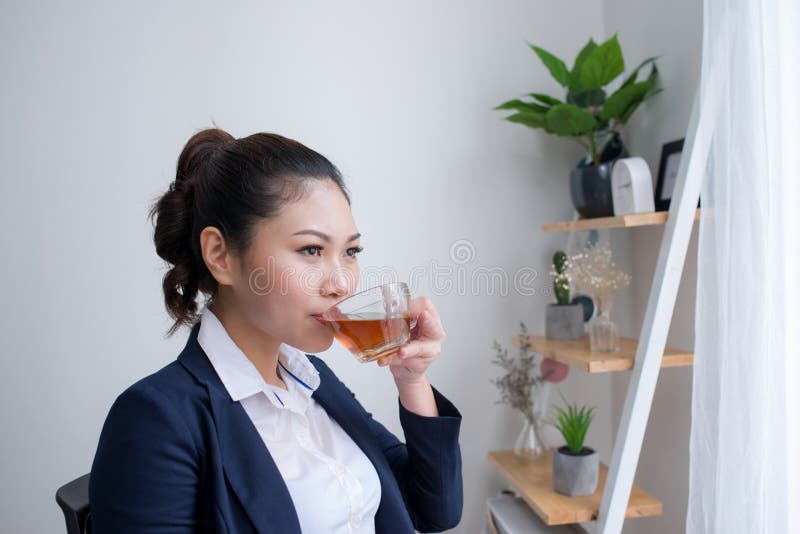 Young Attractive Office Worker Drinking Cup of Tea, Having Coffee Break ...