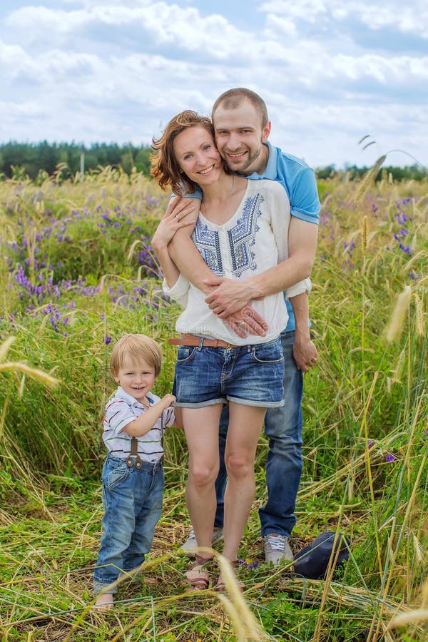 Young Attractive Parents and Child Portrait Stock Photo - Image of ...