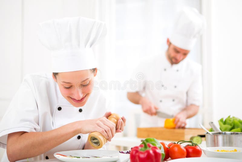 Young Attractive Professional Chef Cooking in His Kitchen Stock Photo ...