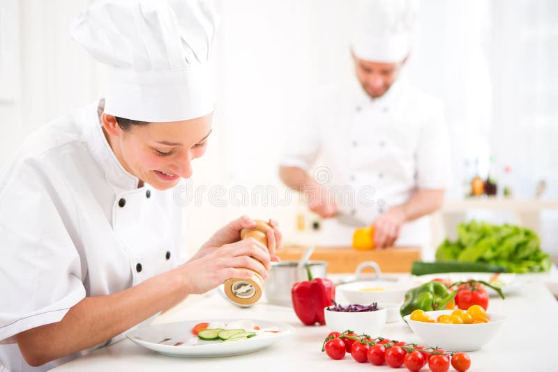 Young Attractive Professional Chef Cooking in His Kitchen Stock Photo ...