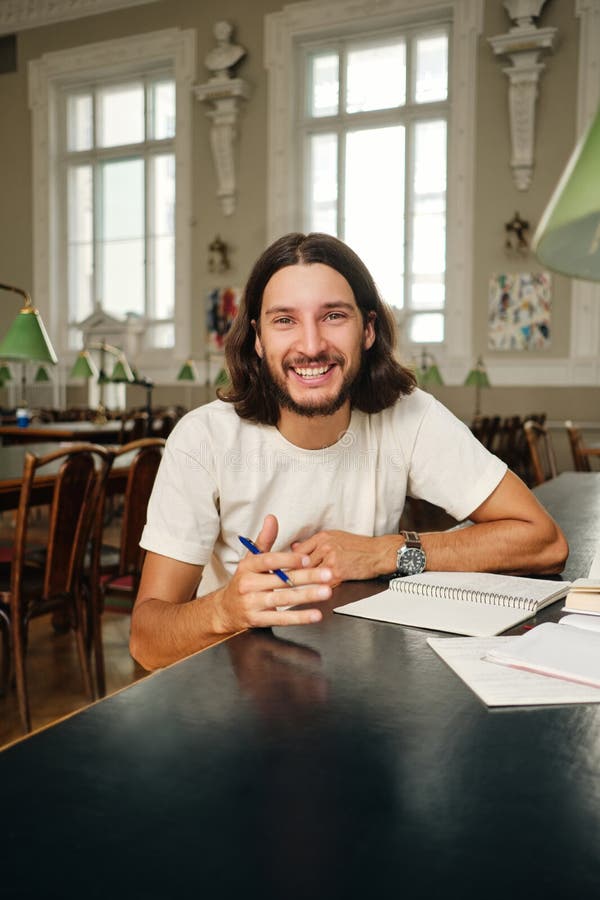 Young Attractive Smiling Male Student Joyfully Looking in Camera while ...