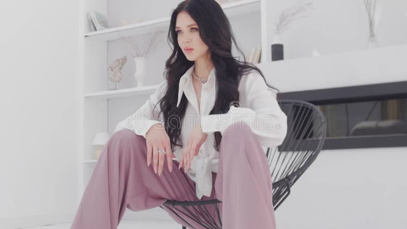 Young Attractive Spectacular Model in a Photo Shoot in a White Studio ...