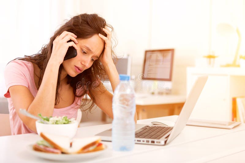 Young Attractive Student Eating while Working Stock Image - Image of ...
