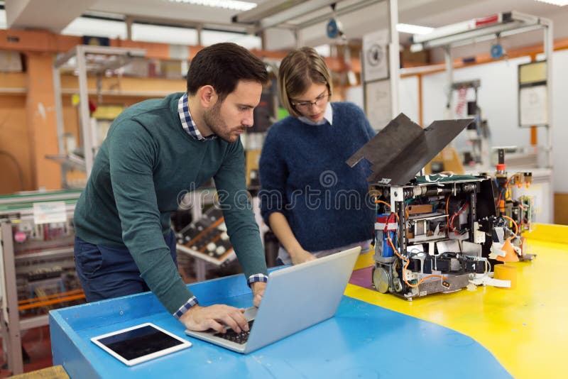 Young Attractive Students of Mechatronics Working on Project Stock ...
