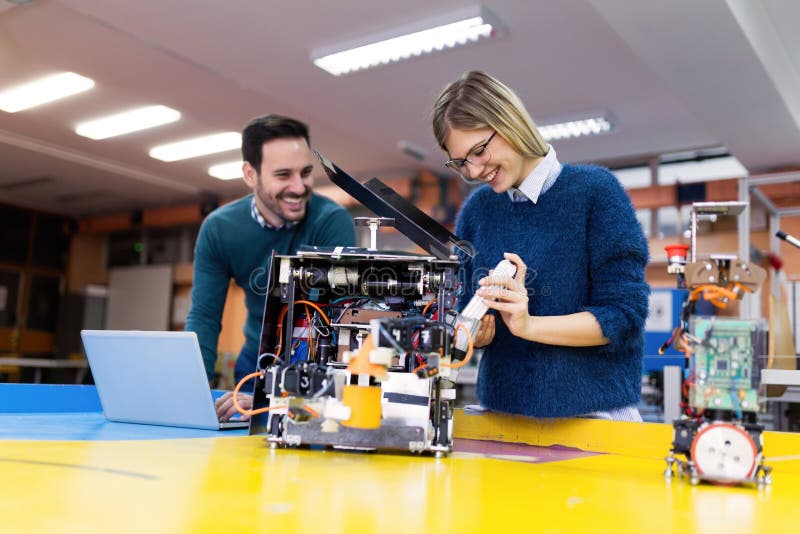 Young Attractive Students of Mechatronics Working on Project Stock ...