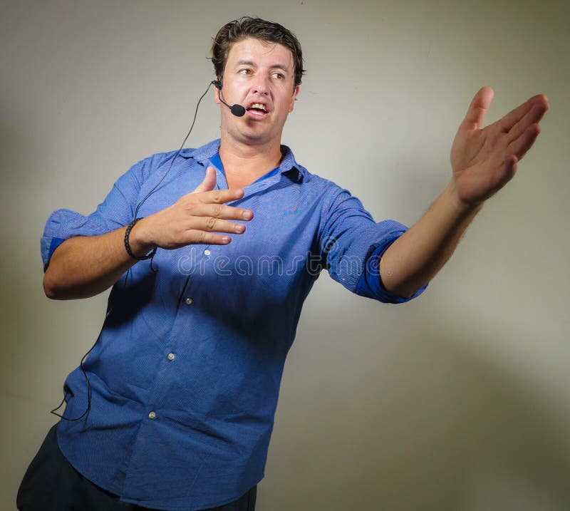 Young Attractive and Successful Man Giving Motivation Coaching Speech ...