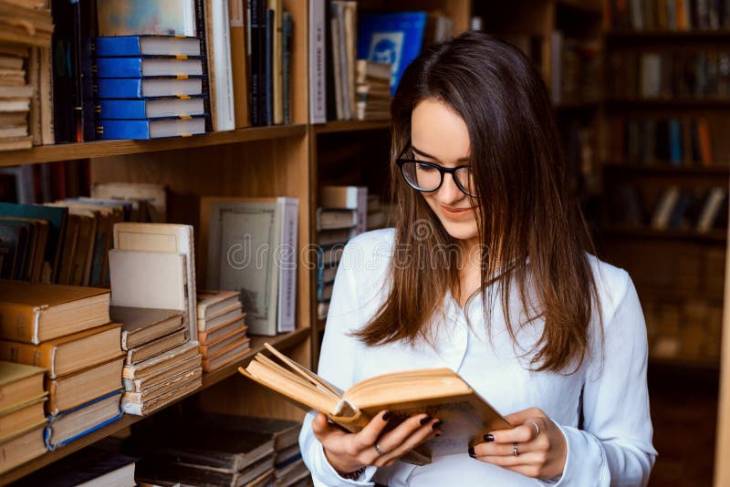 Young Attractive University Student Reading a Book Stock Photo - Image ...