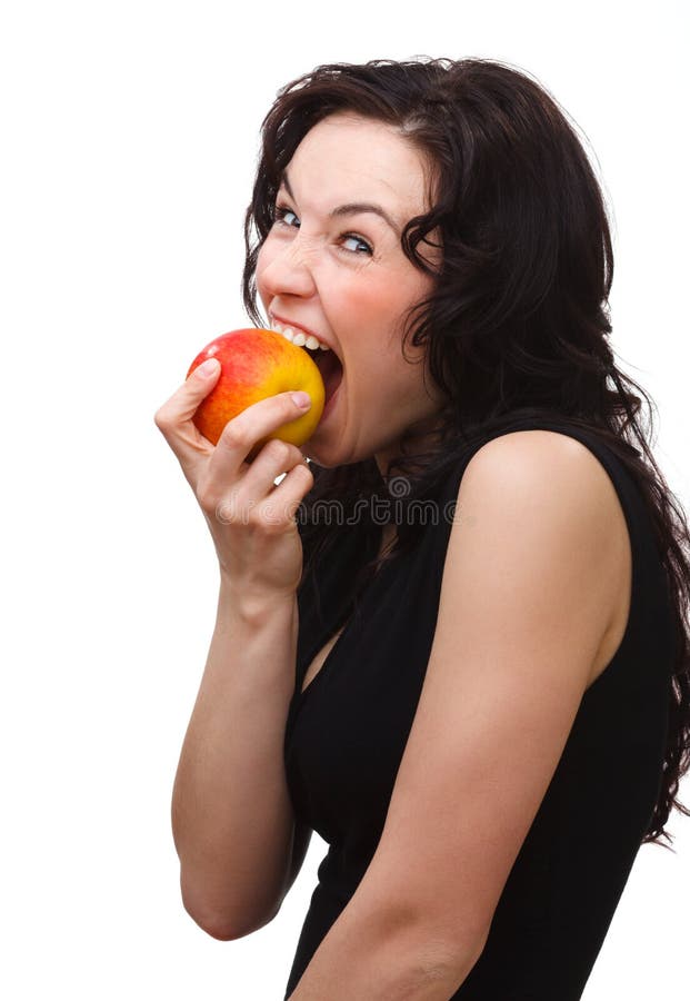 Young Attractive Woman is Biting an Apple Stock Image - Image of apple ...