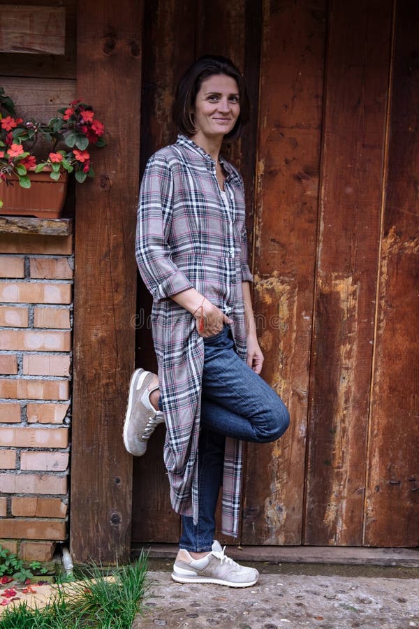 Young Attractive Woman in a Checkered Dress Stock Image - Image of ...