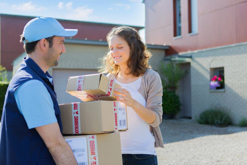 Young Attractive Woman Checking Her Parcel Stock Image - Image of ...
