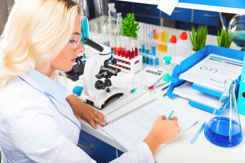 Young Attractive Woman Scientist Researching in the Laboratory Stock ... Young Attractive Woman Scientist Researching in the Laboratory Stock ...