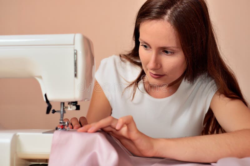 Young Woman in Red Jacket Sitting in Yoga Pose in Mountains Stock Image ...