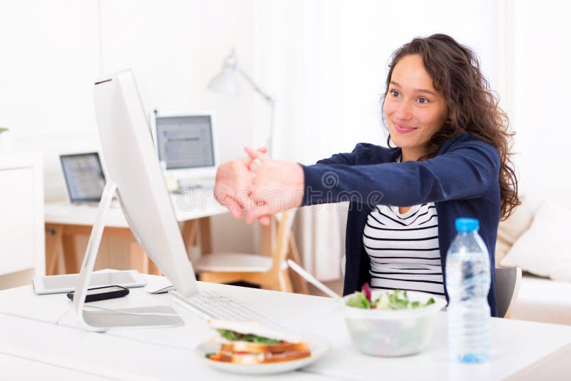 Young Attractive Woman Stretching during a Break Stock Image - Image of ...