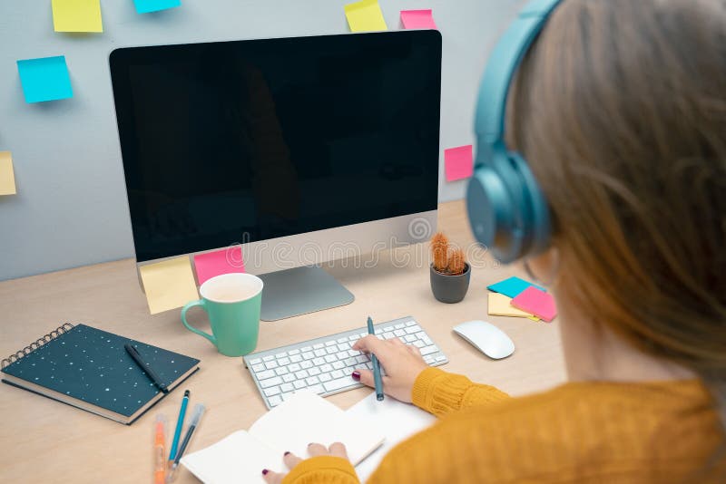 Young Attractive Woman Working from Home on Her Workplace. Stock Photo ...