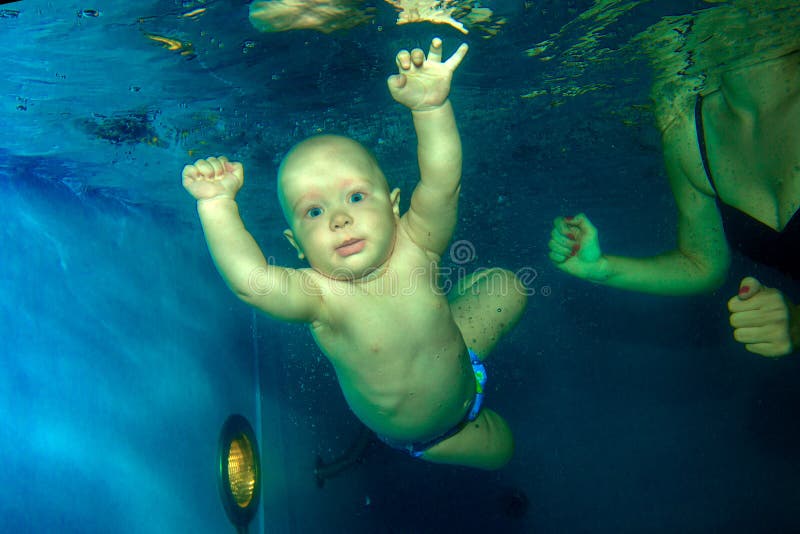 Young Baby Diving in the Swimming Pool. Stock Image - Image of baby ...