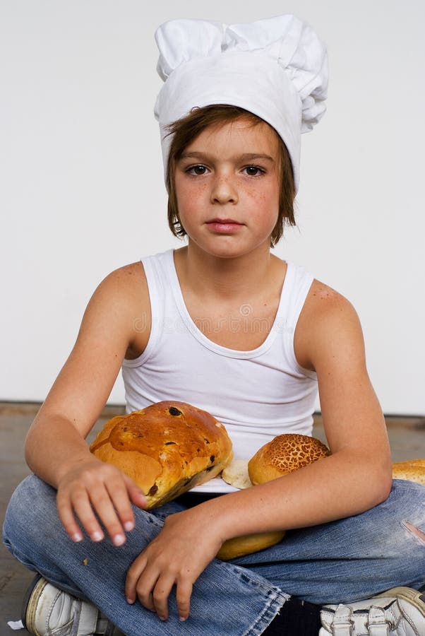 Young baker boy and bread stock image. Image of pastry - 8641959